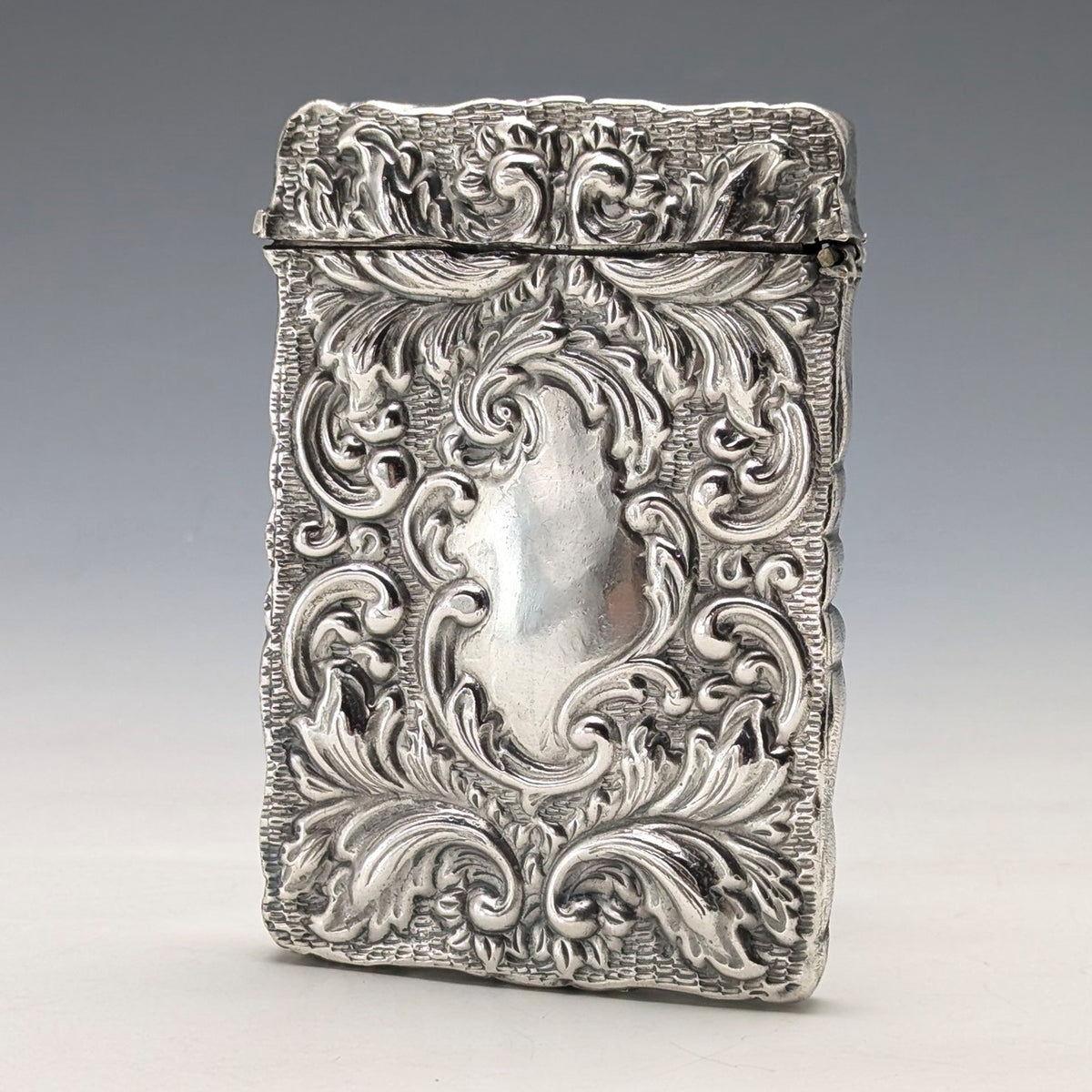 Antique American sterling silver card case with embossed decoration, 7 ...