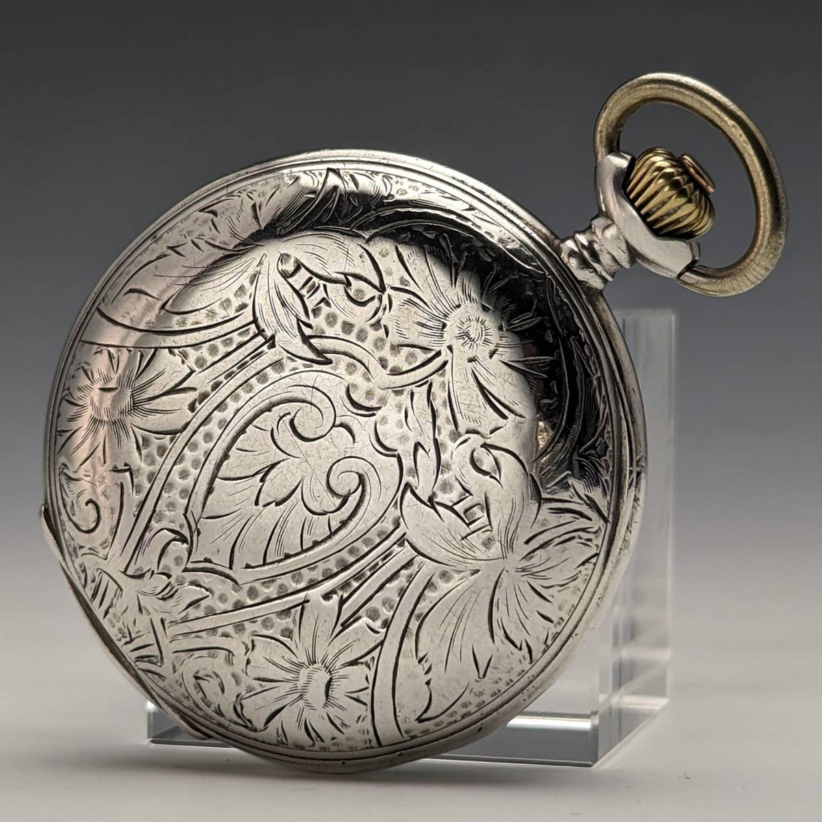 Around 1910 Antique Omega pocket watch Flower engraving Silver side hu ...